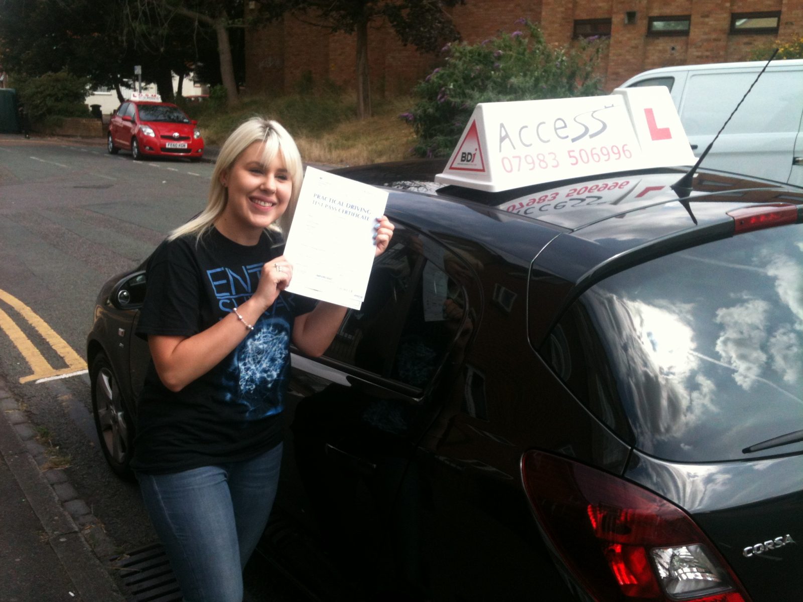 Female Driving Instructor Reading - Access Driving School